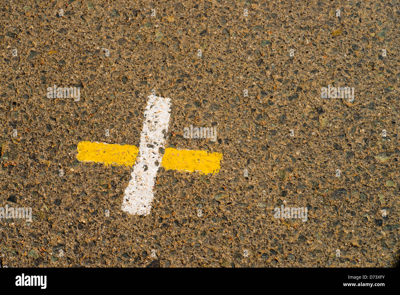 Painted cross meaning wrong way for hikers Stock Photo - Alamy