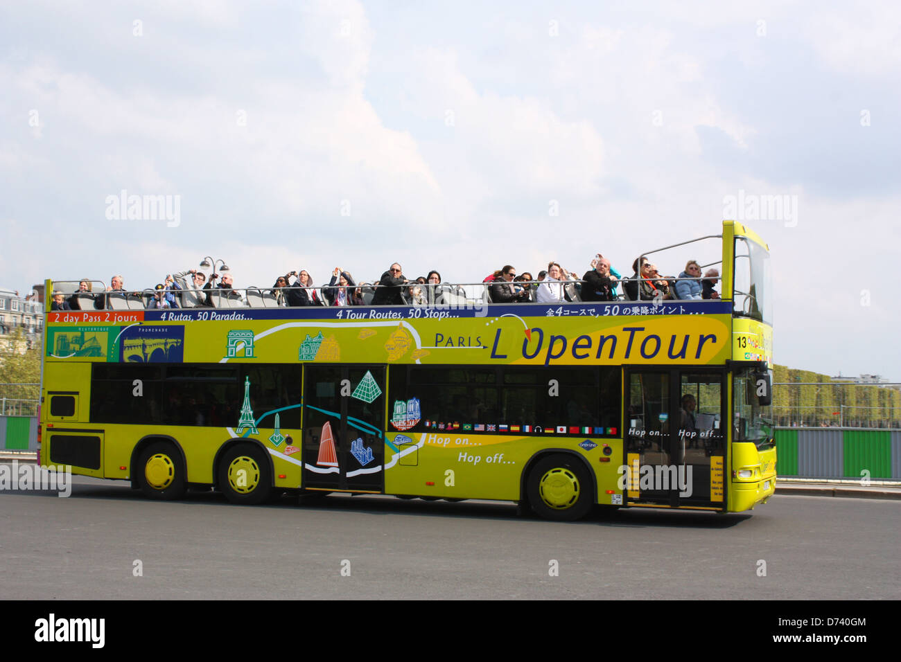 Open top tour bus in Paris, France Stock Photo - Alamy