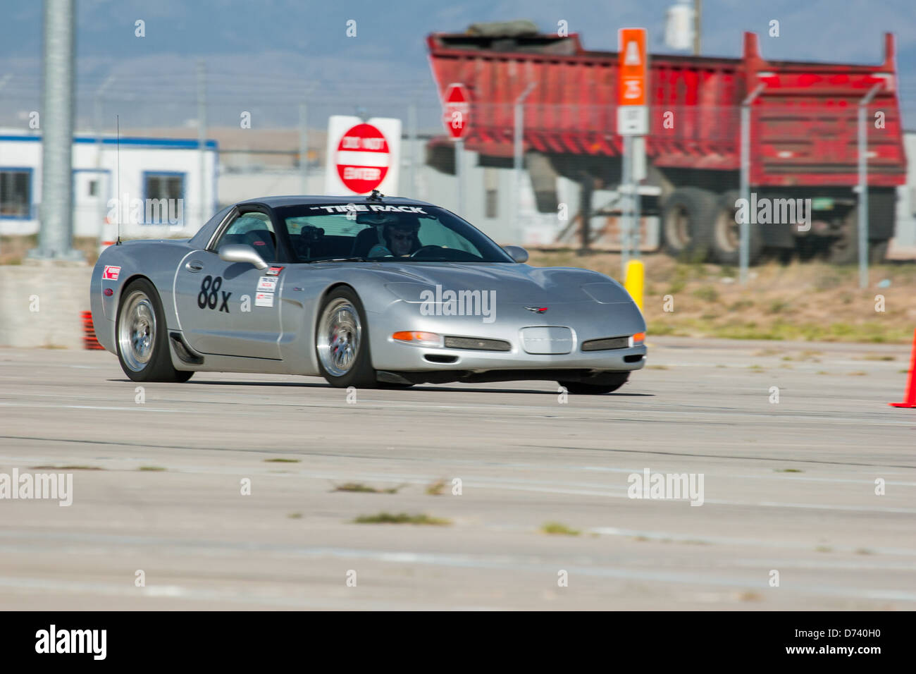 A 2001 Grey Chevrolet Corvette Z06 in an autocross race at a regional ...