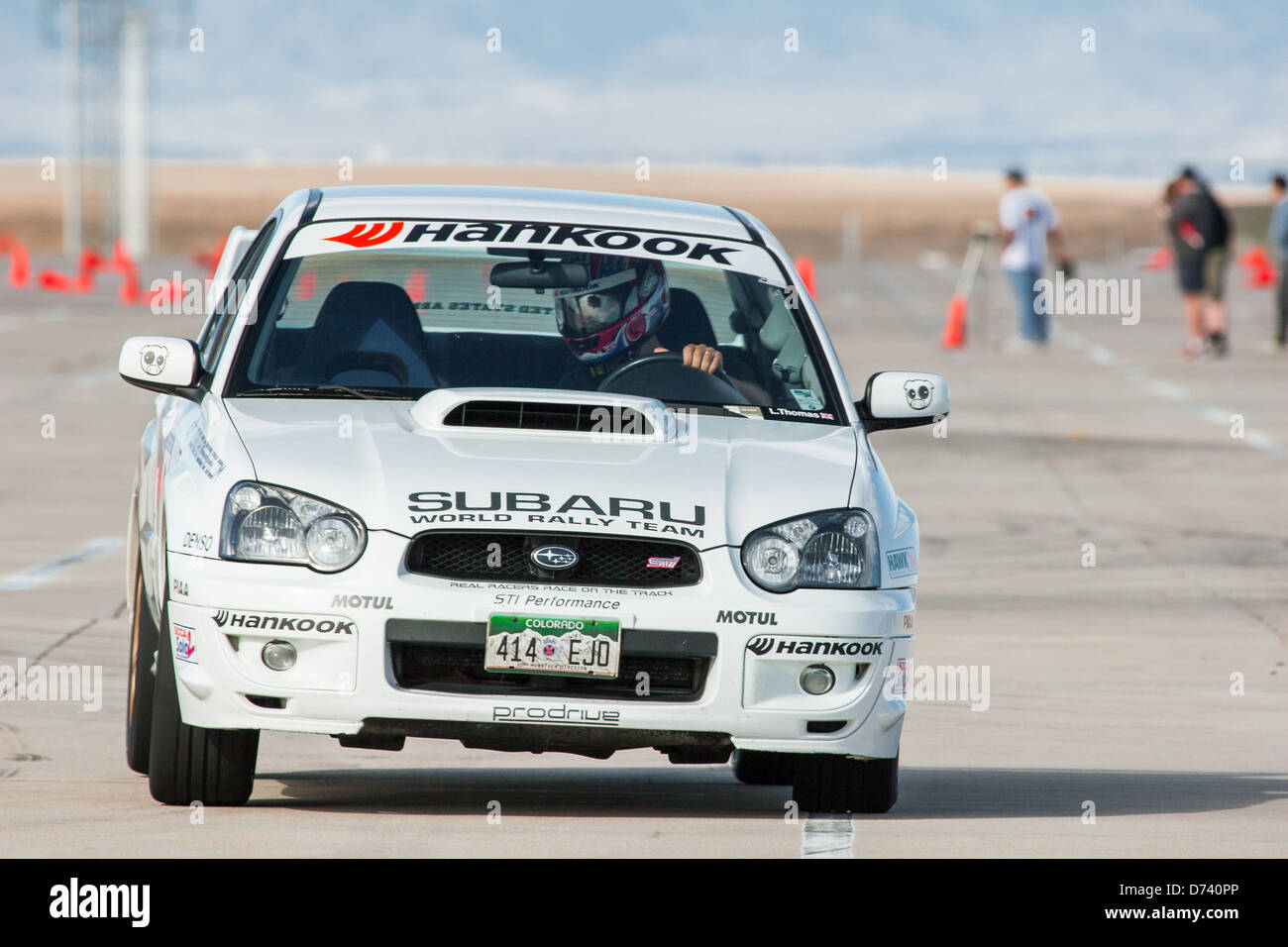 A 2004 White Subaru STI in an autocross race at a regional Sports Car ...