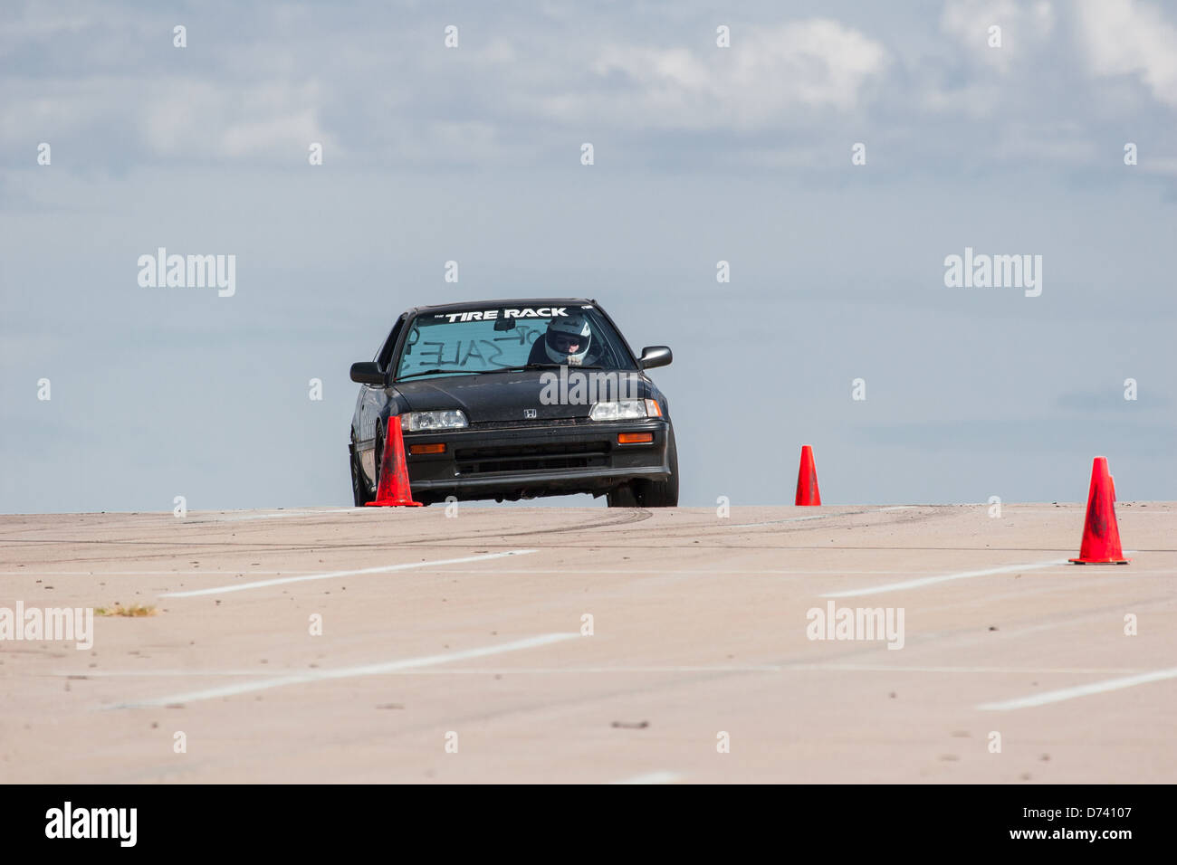 A 1989 Black Honda Civic Si in an autocross race at a regional Sports ...