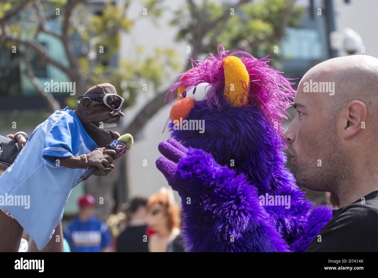 Los Angeles, California, U.S. April 28, 2013. Participant show off ...
