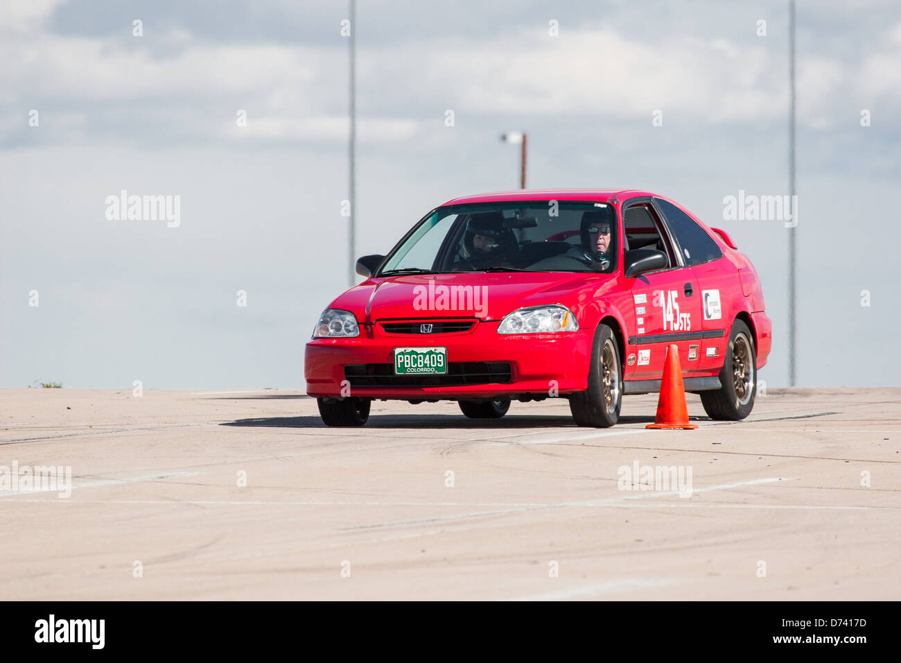 A 1996 Red Honda Civic in an autocross race at a regional Sports Car ...