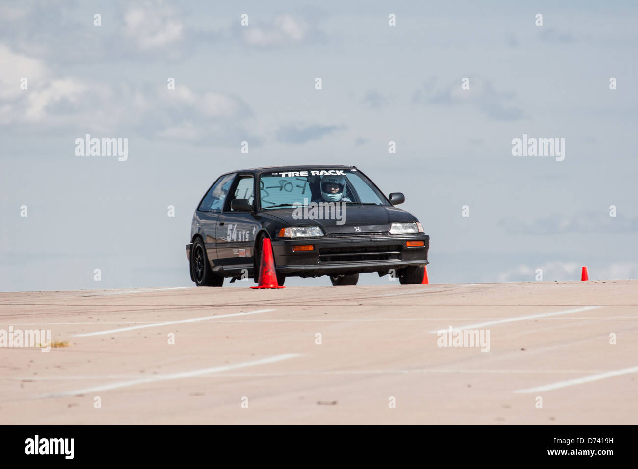 A 1989 Black Honda Civic Si in an autocross race at a regional Sports ...