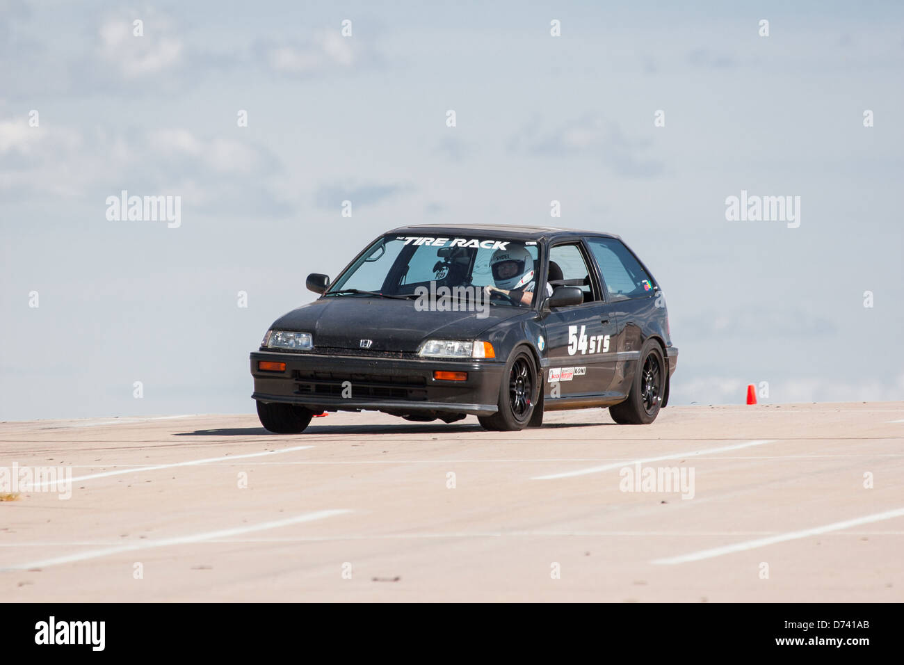 A 1989 Black Honda Civic Si in an autocross race at a regional Sports ...