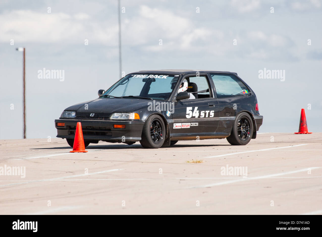 A 1989 Black Honda Civic Si in an autocross race at a regional Sports ...