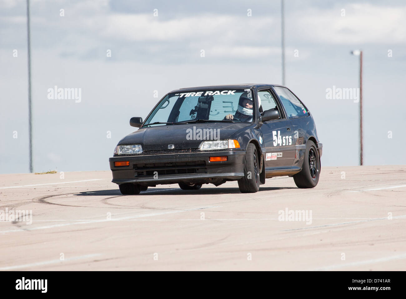 A 1989 Black Honda Civic Si in an autocross race at a regional Sports ...