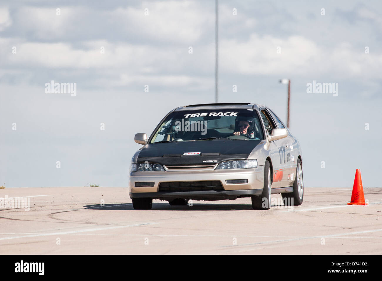 A 1995 Gray Honda Accord in an autocross race at a regional Sports Car ...