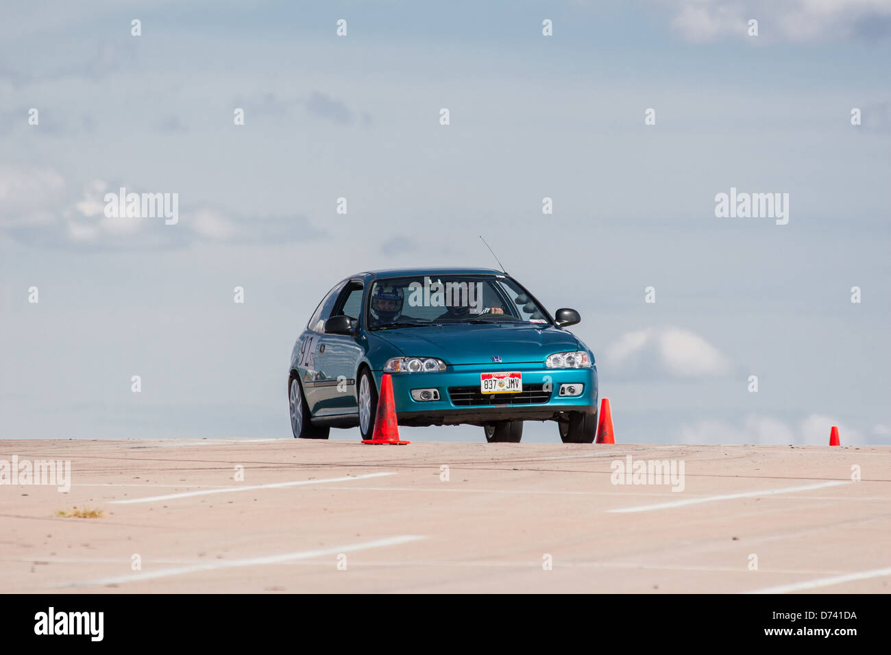 A 1992 Blue Honda Civic Hatchback in an autocross race at a regional ...