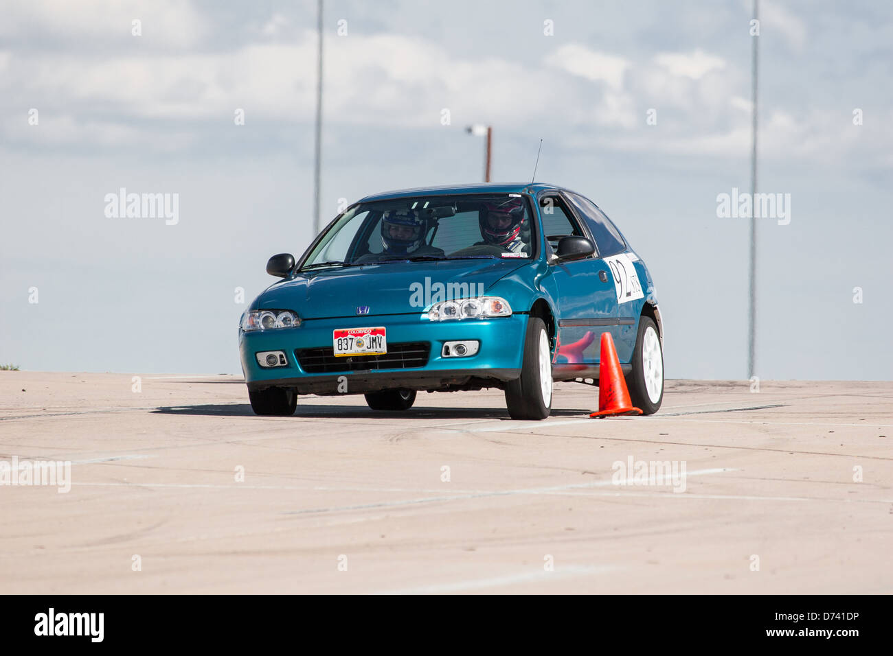 A 1992 Blue Honda Civic Hatchback in an autocross race at a regional ...