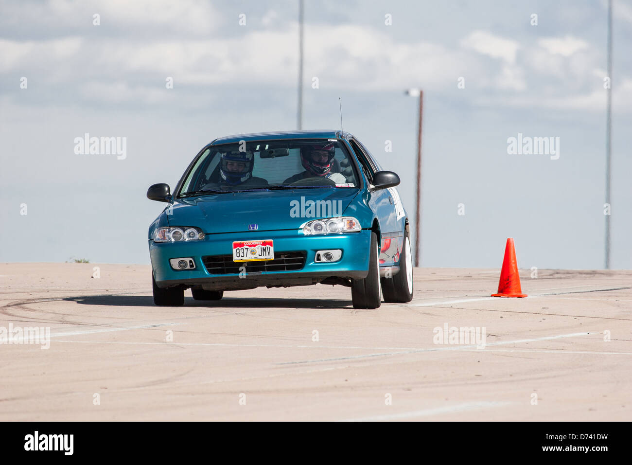A 1992 Blue Honda Civic Hatchback in an autocross race at a regional ...