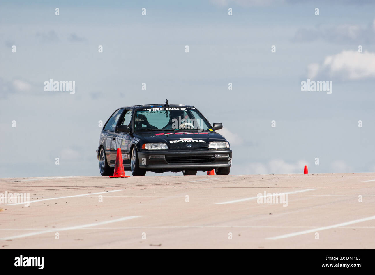A 1990 Black Honda Civic Si in an autocross race at a regional Sports ...