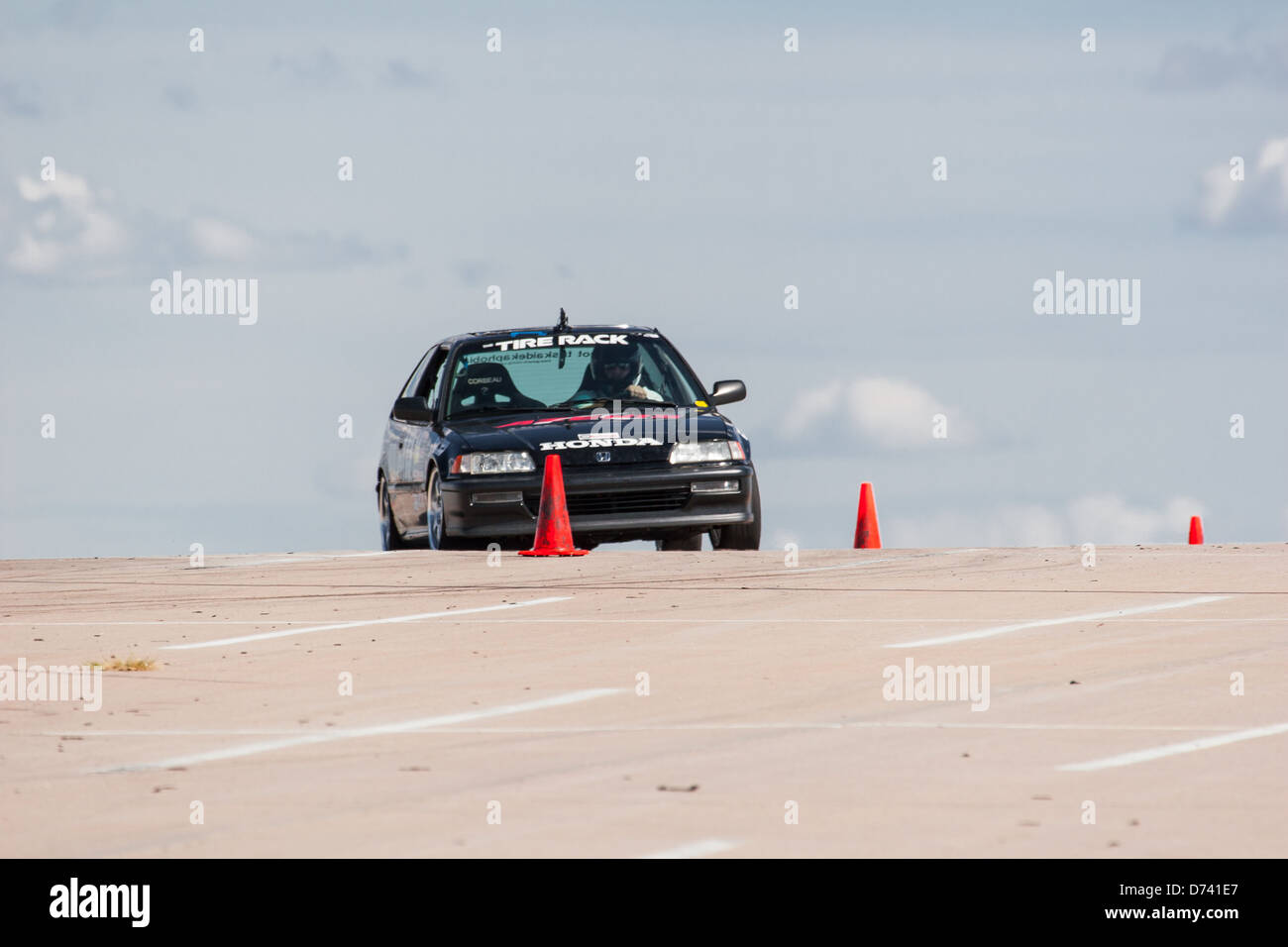 A 1990 Black Honda Civic Si in an autocross race at a regional Sports ...