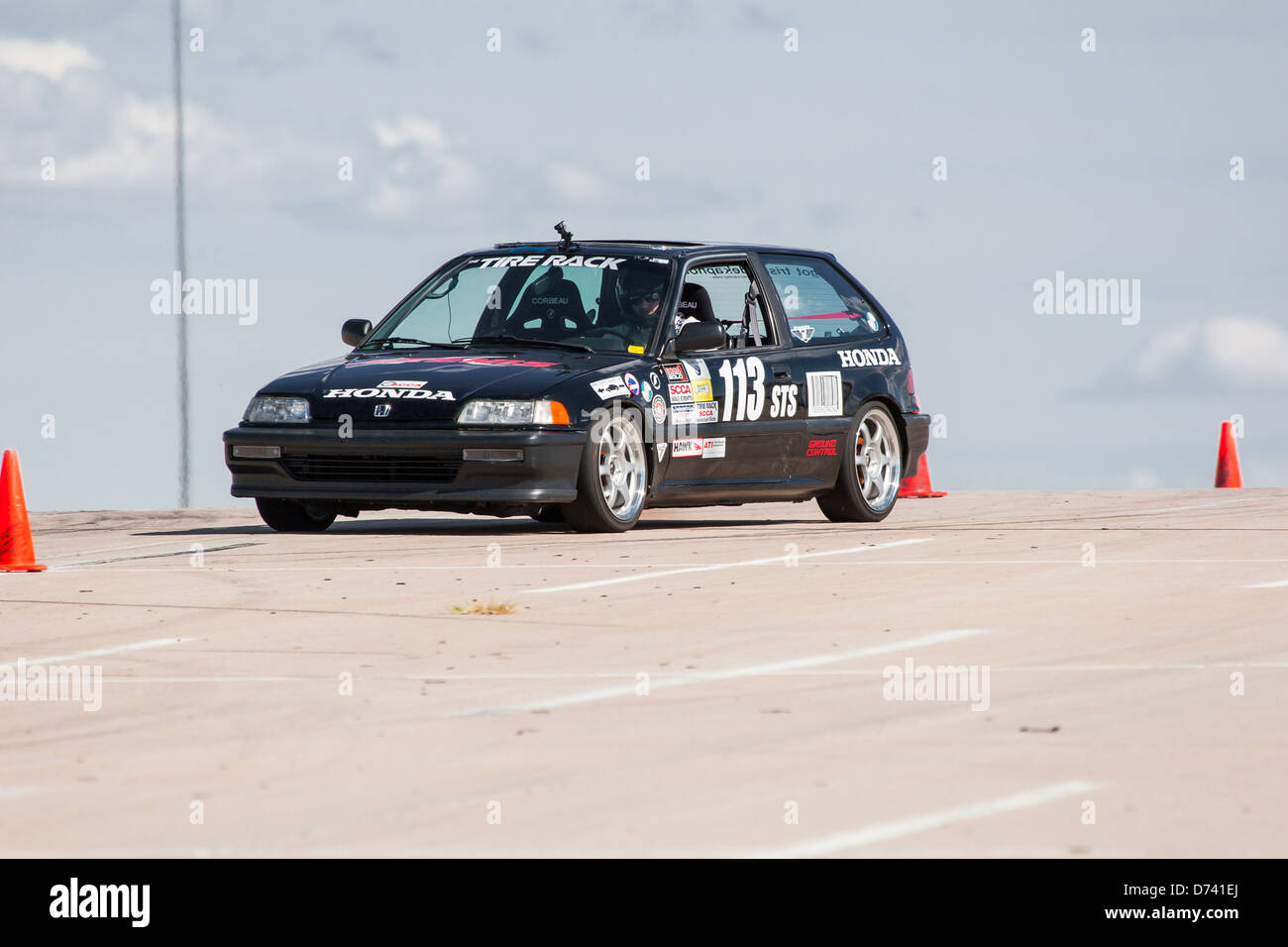 A 1990 Black Honda Civic Si in an autocross race at a regional Sports ...