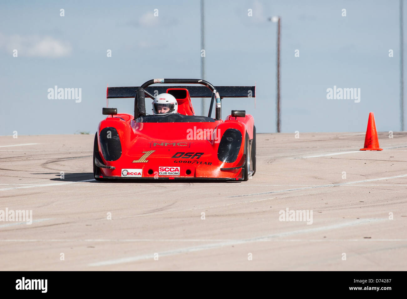 A 2000 Orange Radical Pro-Sport B-Modified open wheel race car in an ...