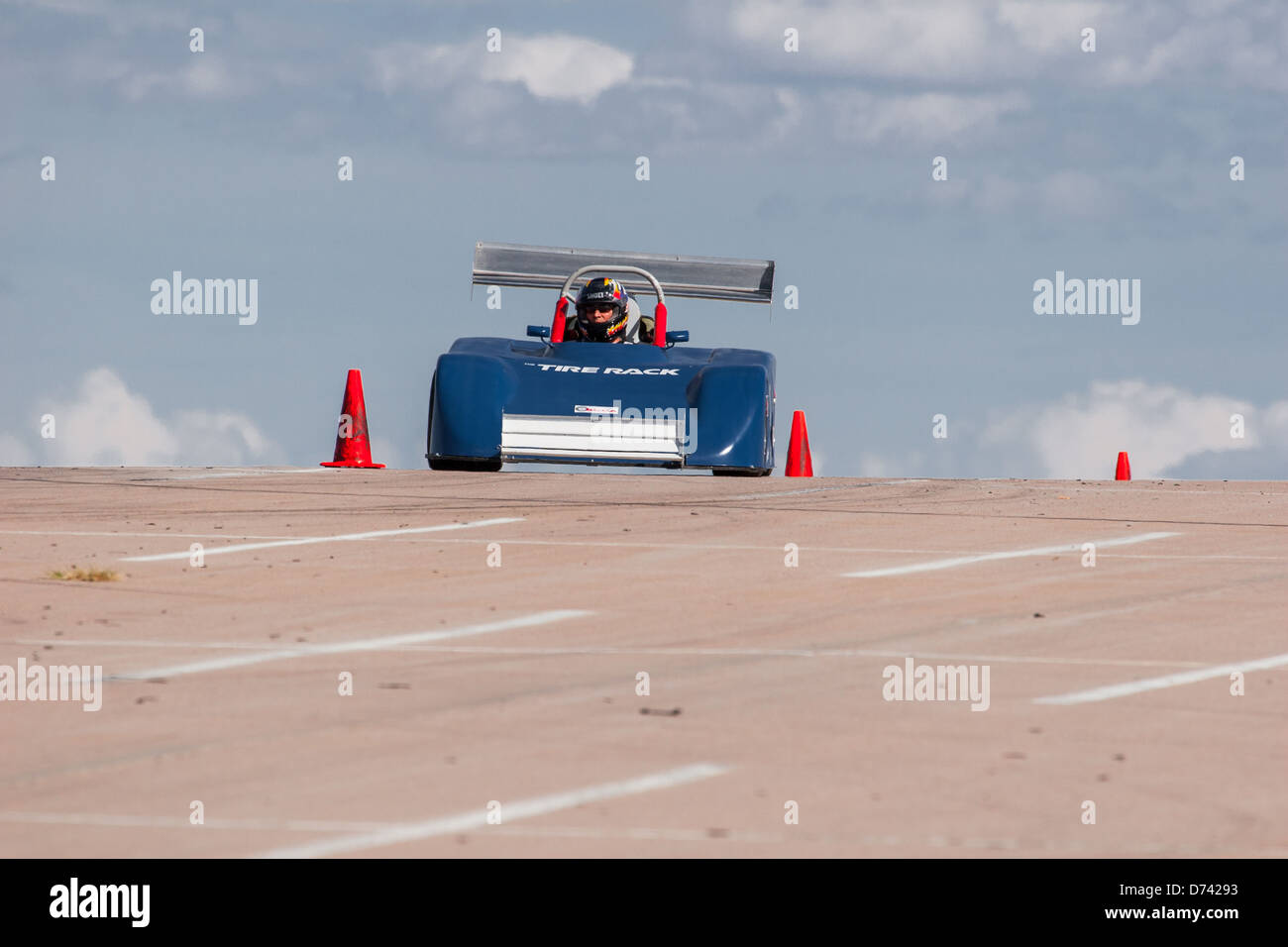 A blue 1998 Cheetah SR-1 B-Modified open wheel race car in an autocross ...