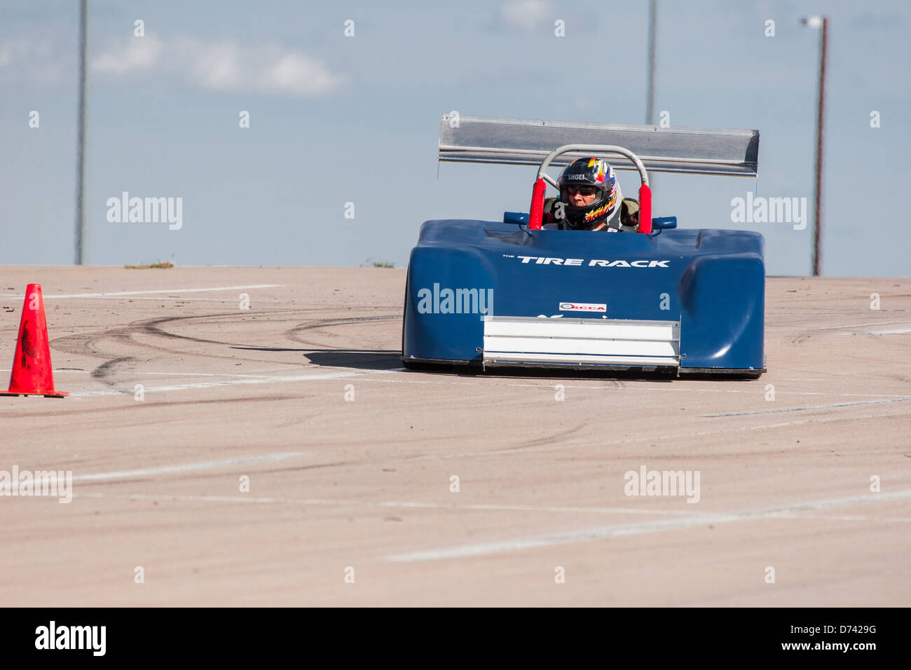 A blue 1998 Cheetah SR-1 B-Modified open wheel race car in an autocross ...
