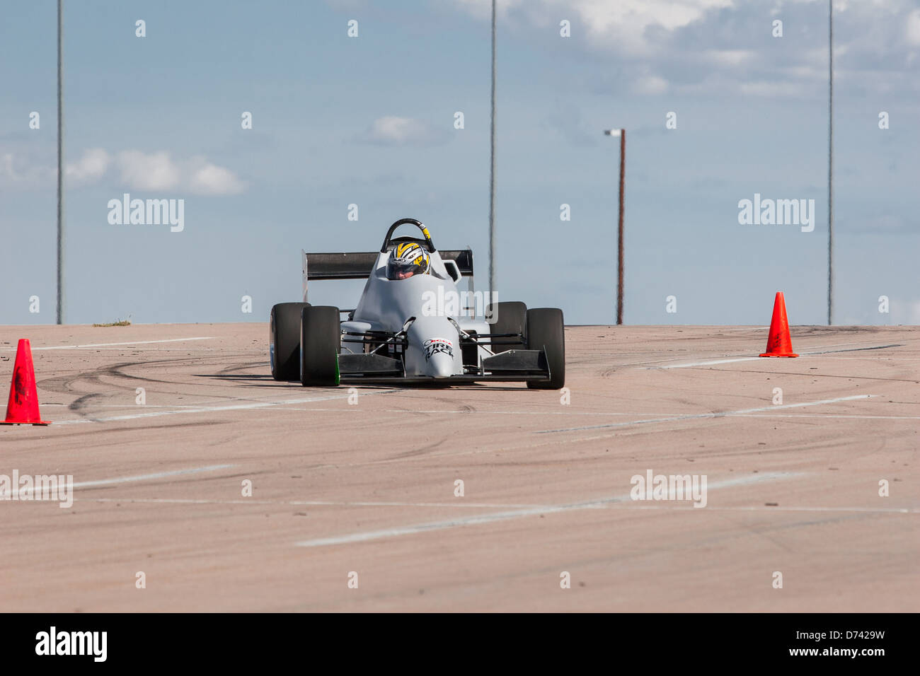 A 2002 Pocket Rocket DC-2 gray B-Modified open wheel race car in an ...