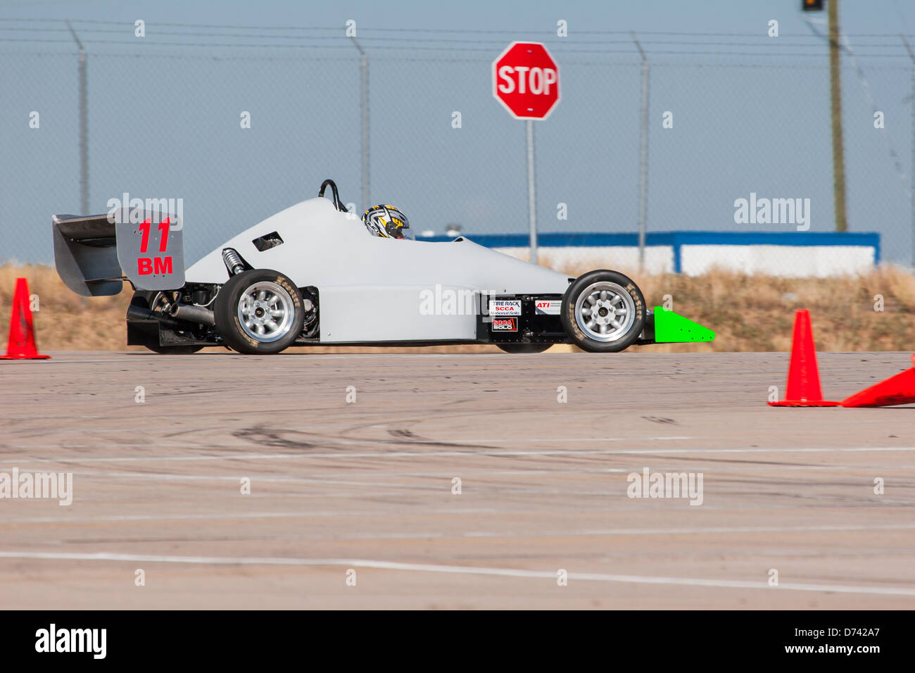 A 2002 Pocket Rocket DC-2 gray B-Modified open wheel race car in an ...