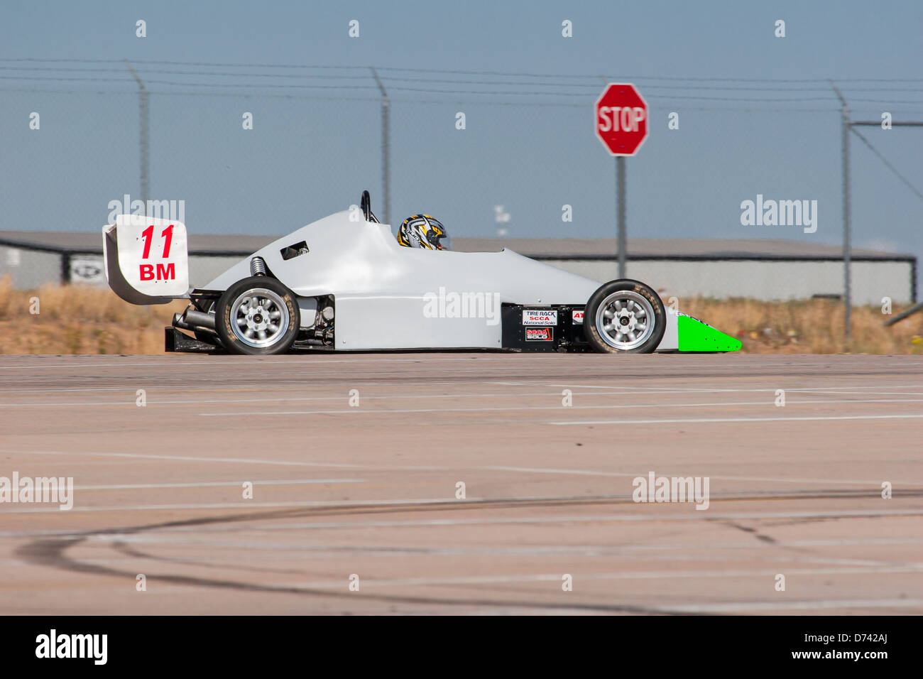 A 2002 Pocket Rocket DC-2 gray B-Modified open wheel race car in an ...