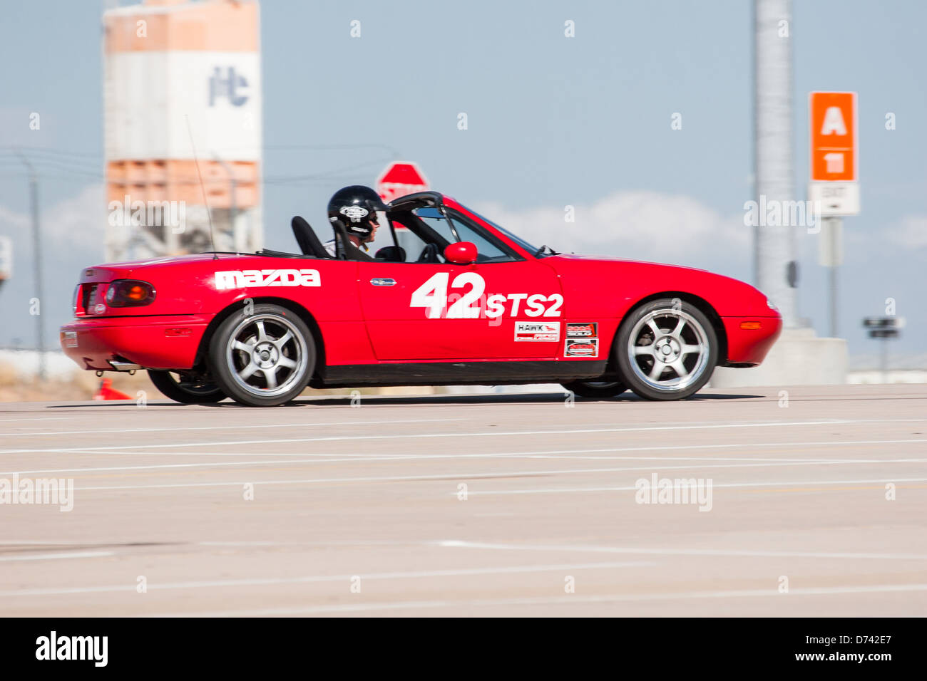 A 1993 Red Mazda Miata in an autocross race at a regional Sports Car ...