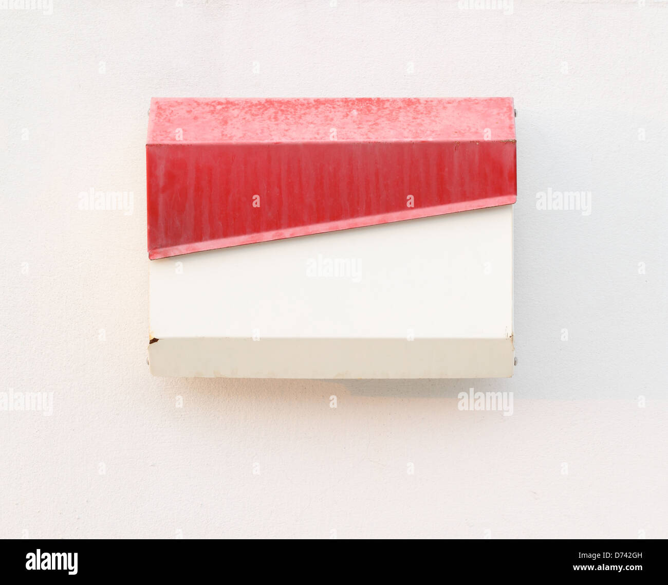 mailbox on white wall background Stock Photo - Alamy