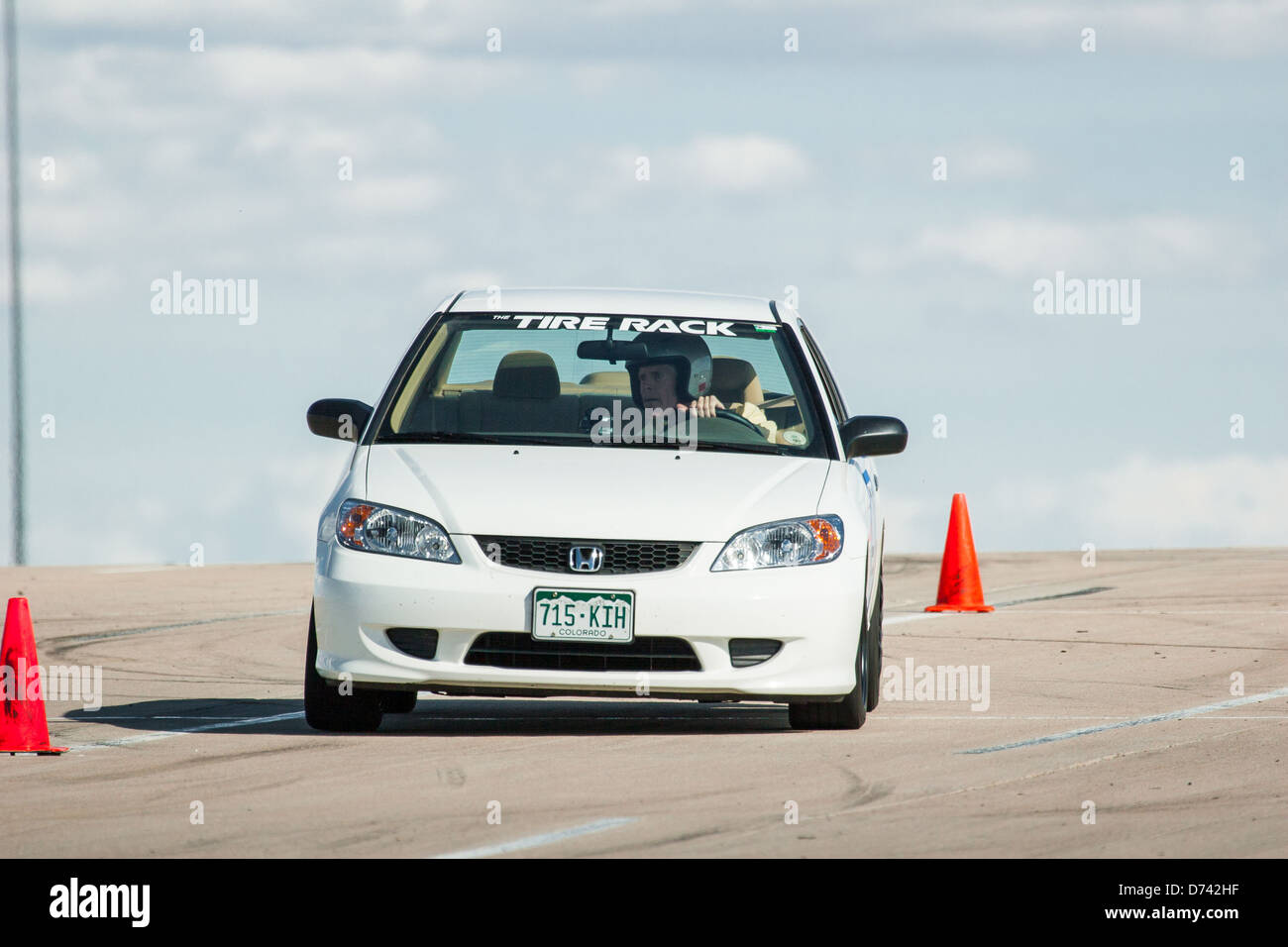 A 2004 White Honda Civic in an autocross race at a regional Sports Car ...