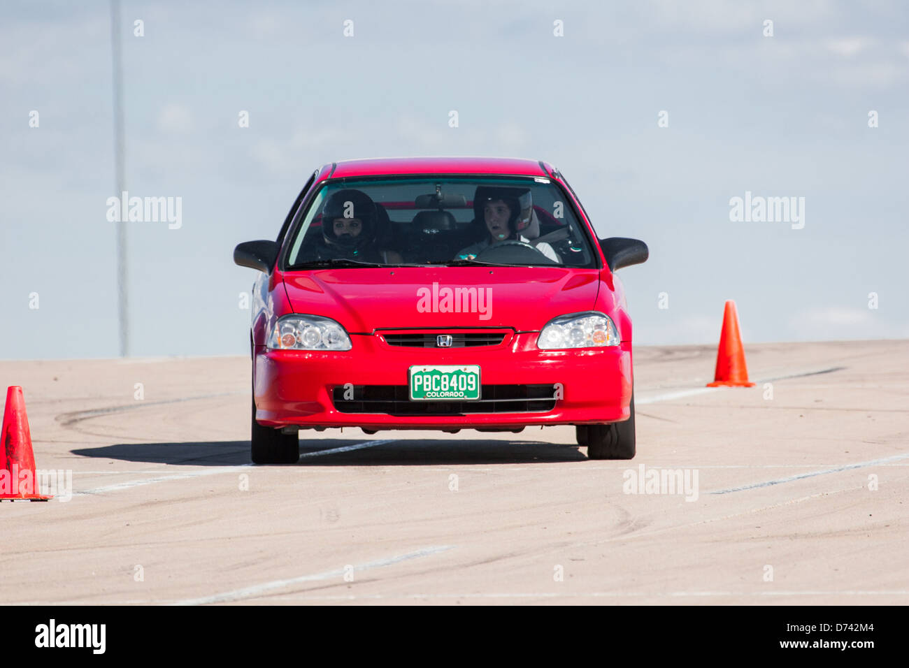 A 1996 Red Honda Civic in an autocross race at a regional Sports Car ...