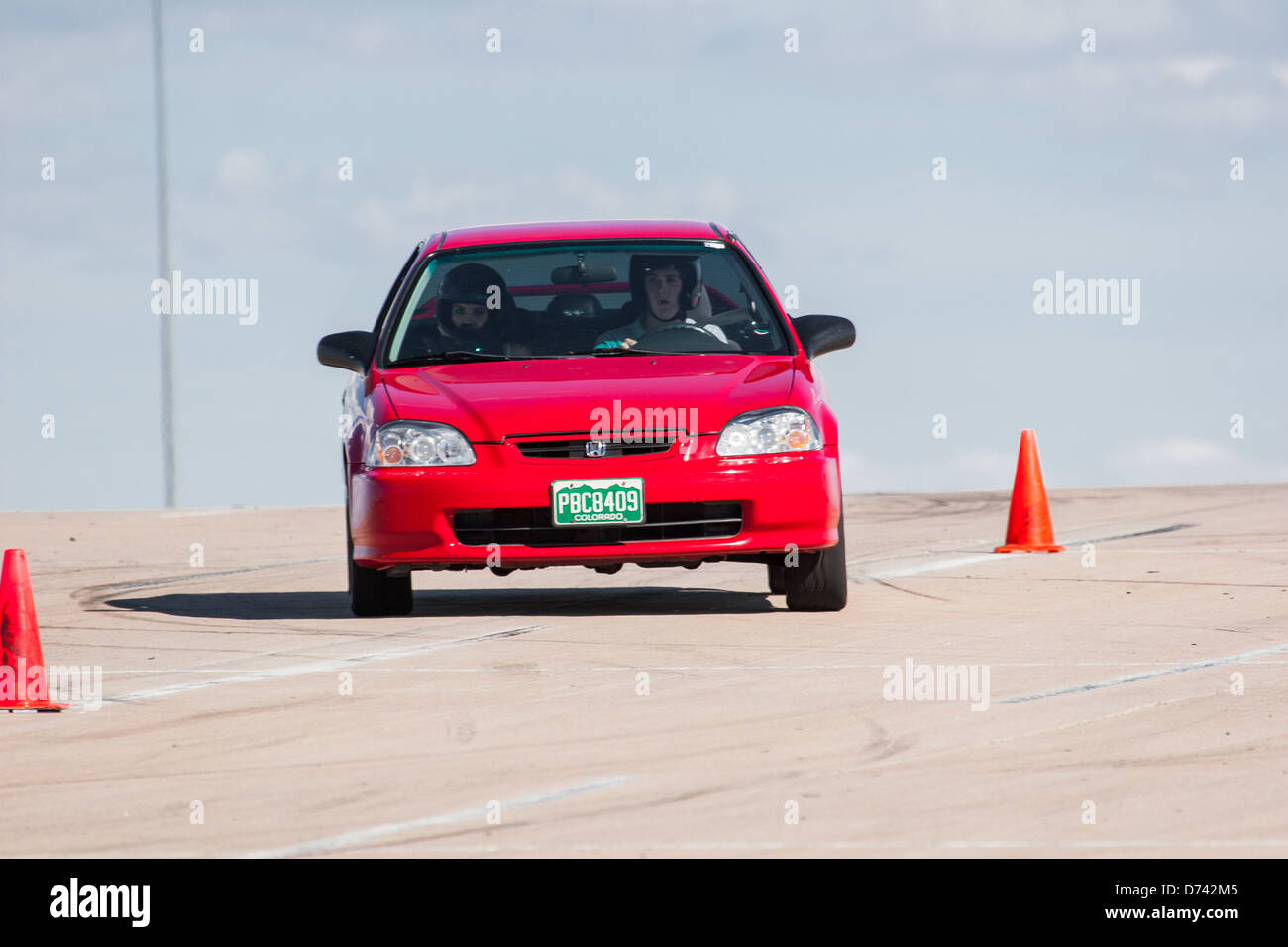 A 1996 Red Honda Civic in an autocross race at a regional Sports Car ...