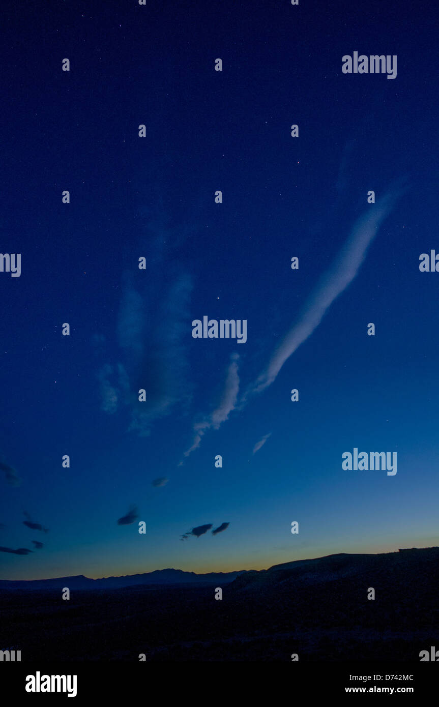 Deep blue sky with stars and clouds Stock Photo - Alamy