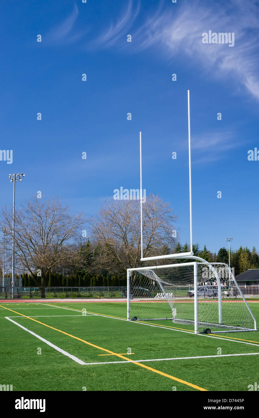 Football and soccer gates on artificial turf field Stock Photo - Alamy