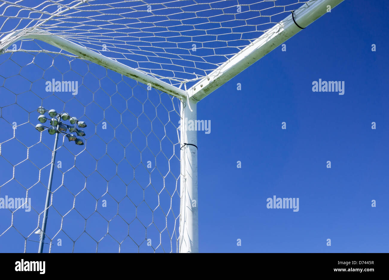 Corner of the soccer gate against blue sky Stock Photo - Alamy