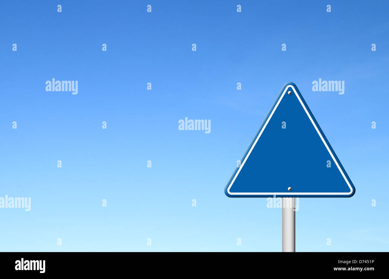 blue triangular road sign with sky balnk fort text Stock Photo - Alamy