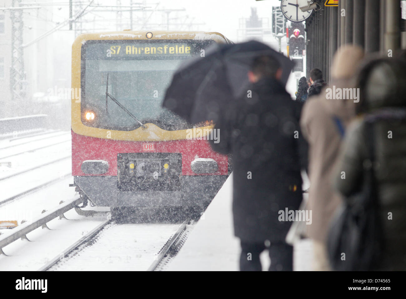 Berlin, Germany, S-train and Passengers with snow on the Charlottenburg ...