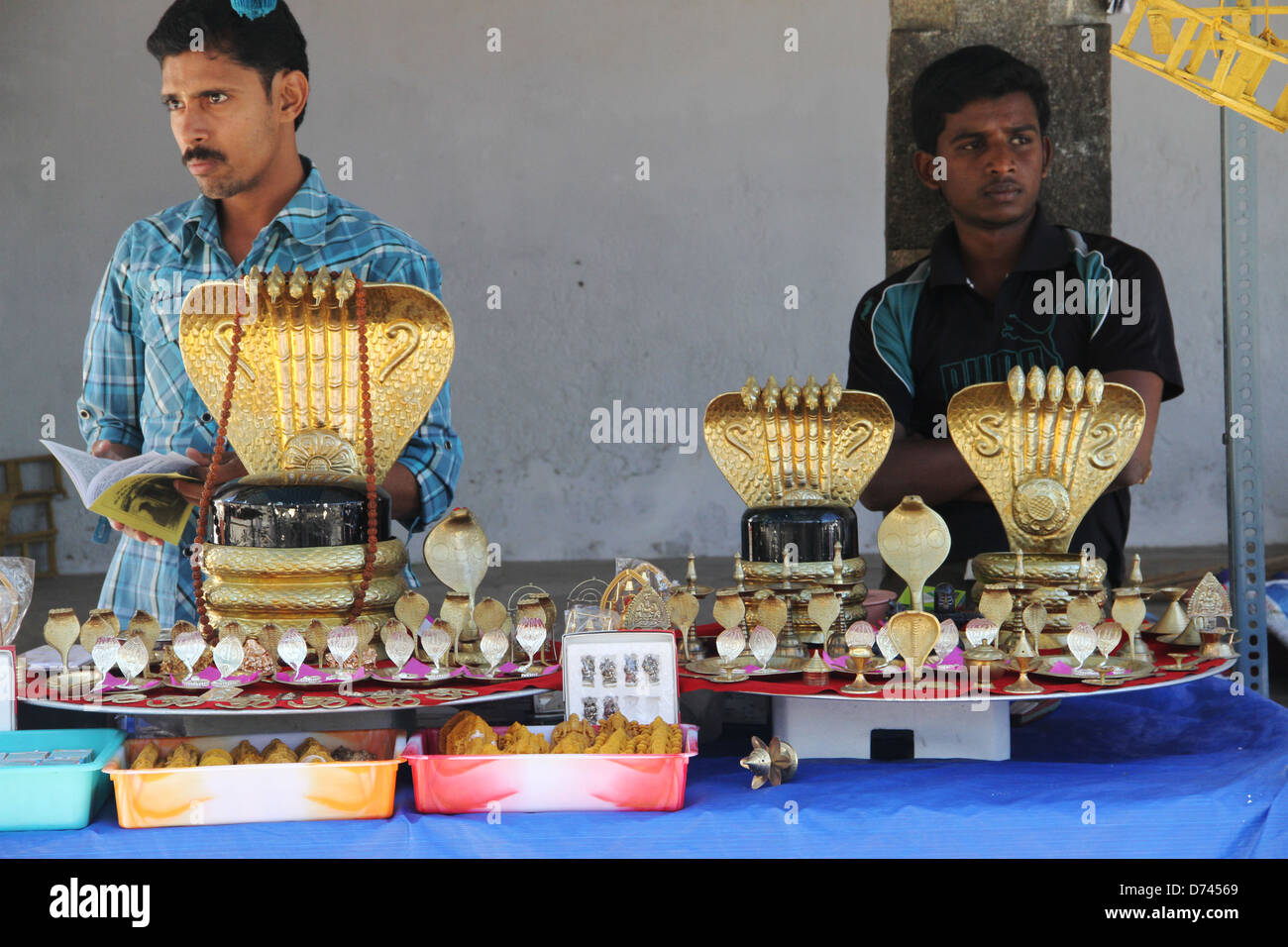 Gold plated Snake figures Stock Photo - Alamy