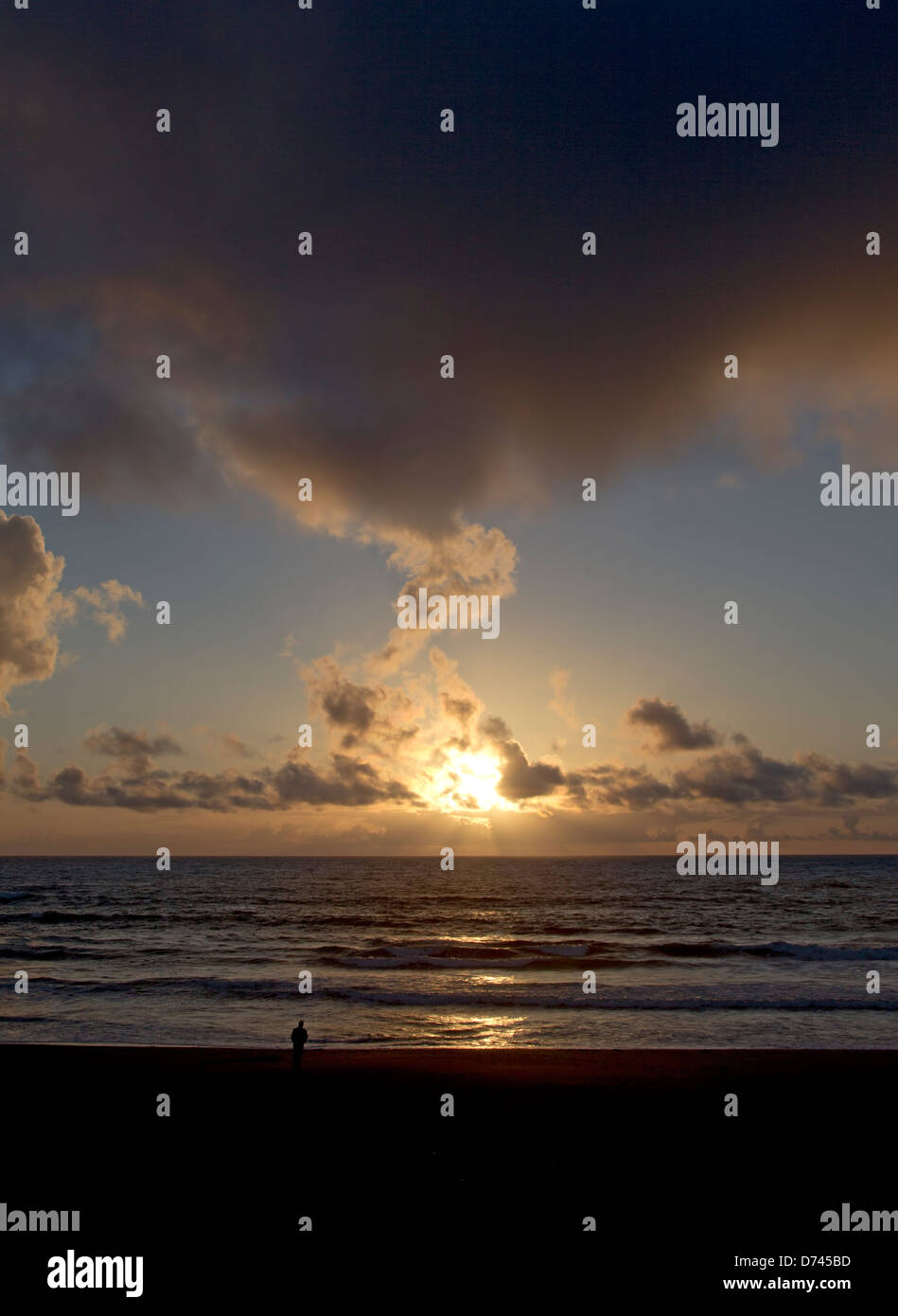 Person watching sunset hi-res stock photography and images - Alamy