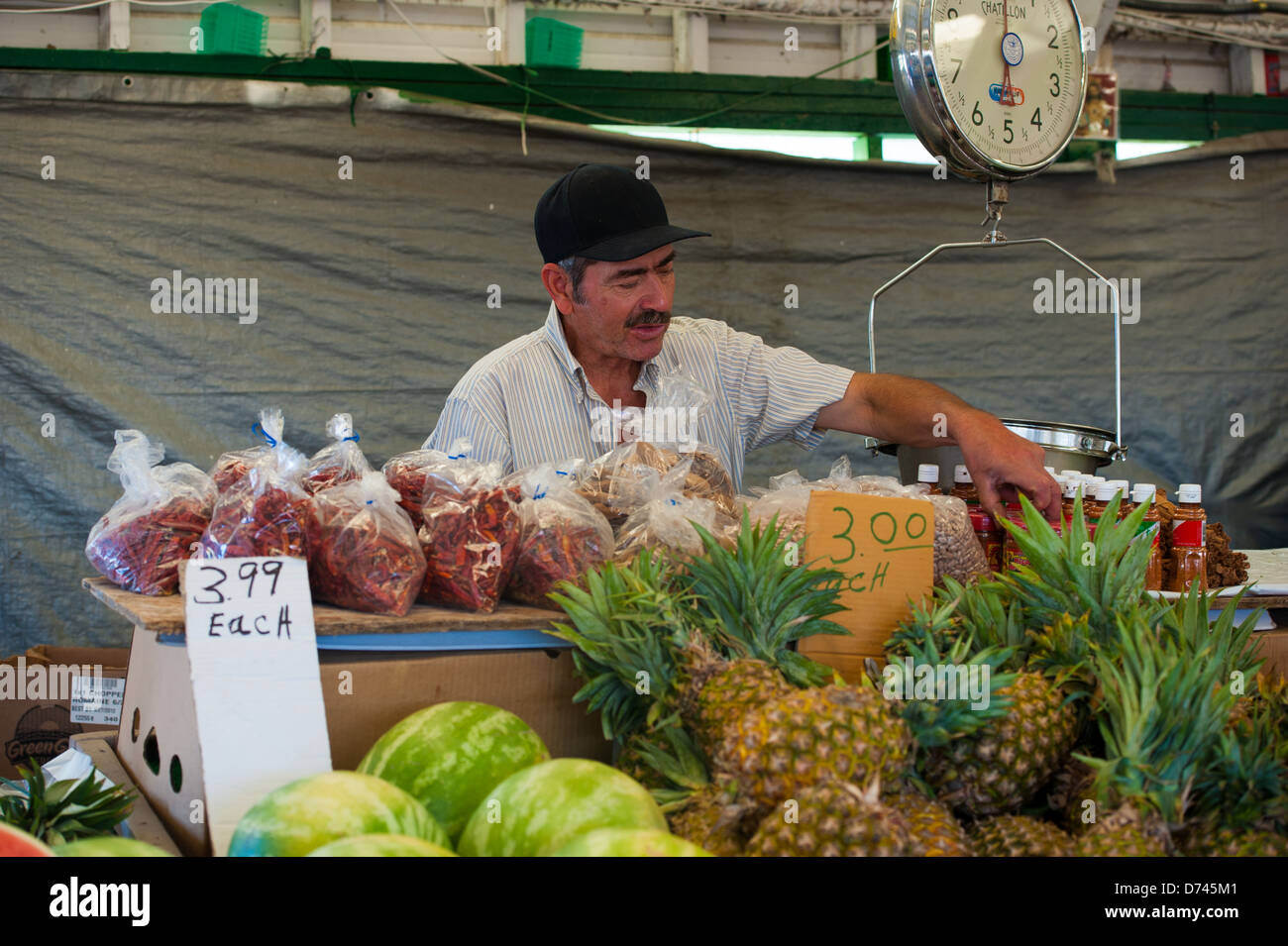 A produce seller at Davis Market, California, U.S.A Stock Photo - Alamy