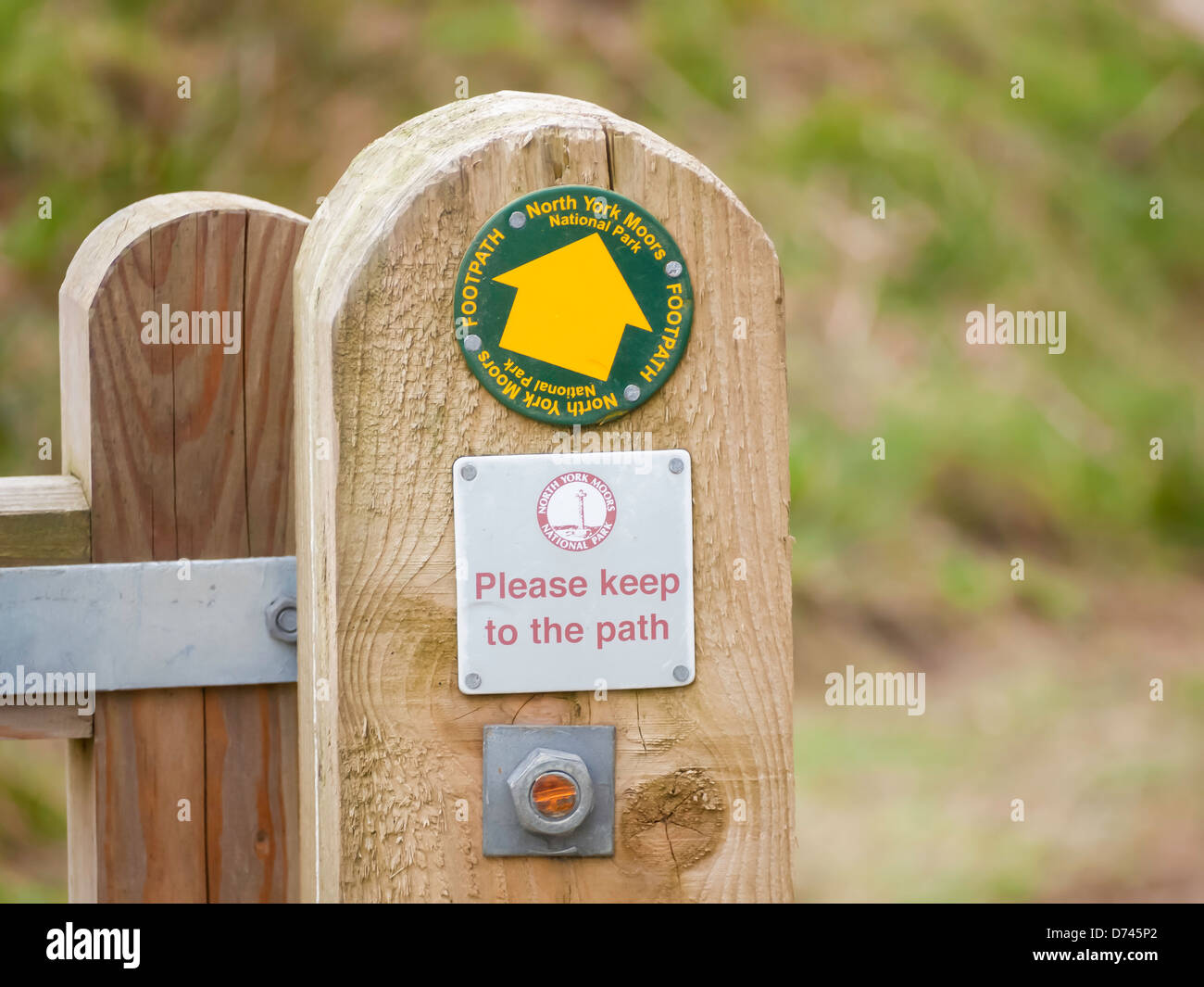 Footpath way mark on a gate post in North Yorkshire Moors National Park ...