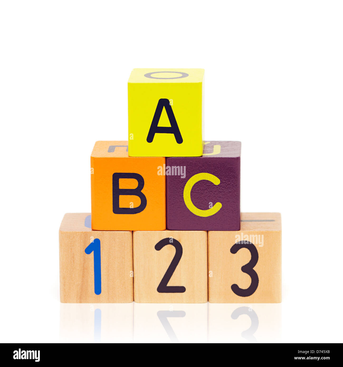 Wooden blocks with letters and numbers isolated on white background ...