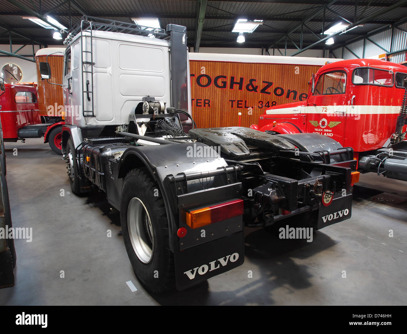 This vintage Volvo truck, characterized by its silver color, reflects ...