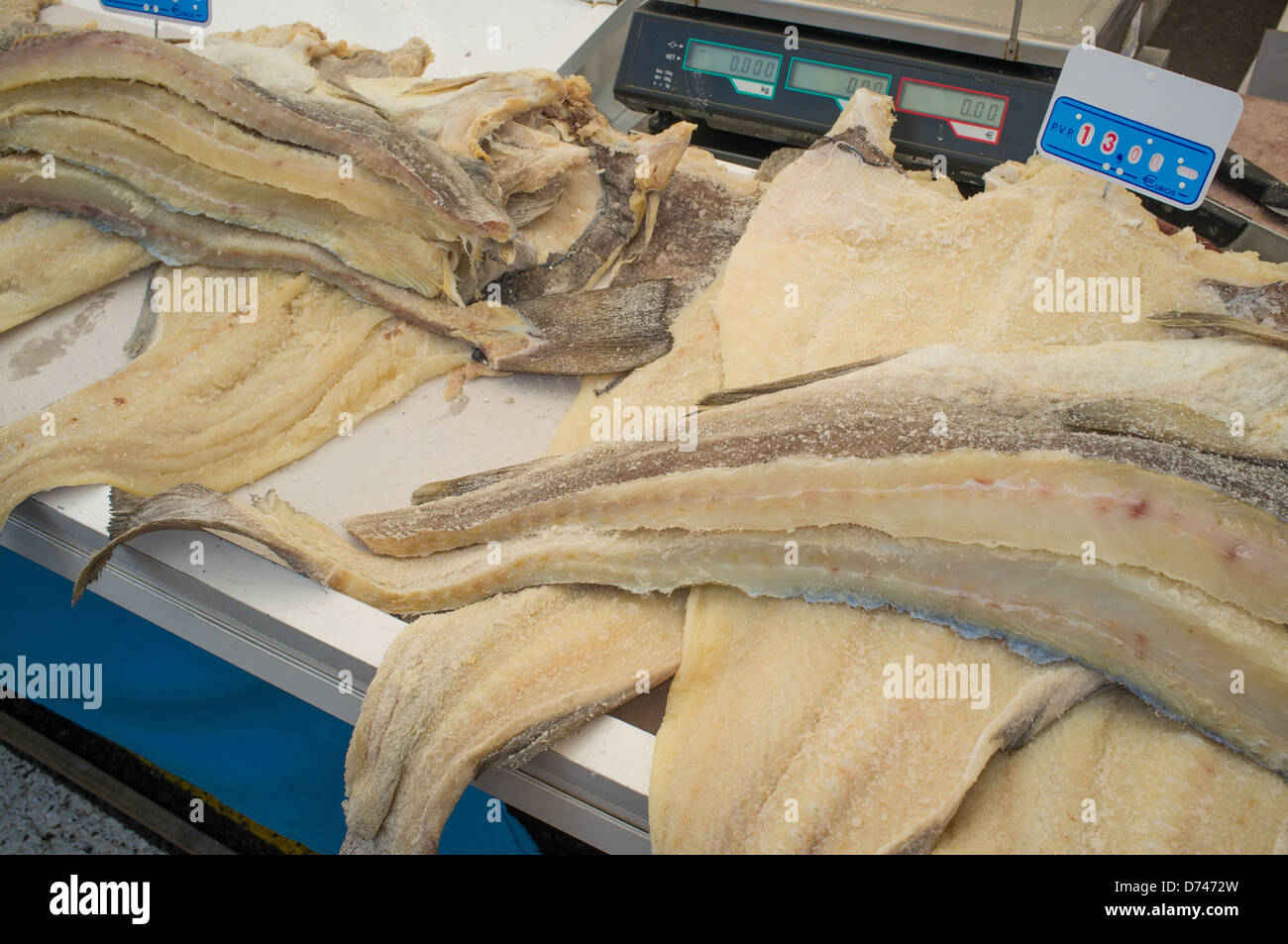 Salted cod fillets on display on a market stall Stock Photo - Alamy