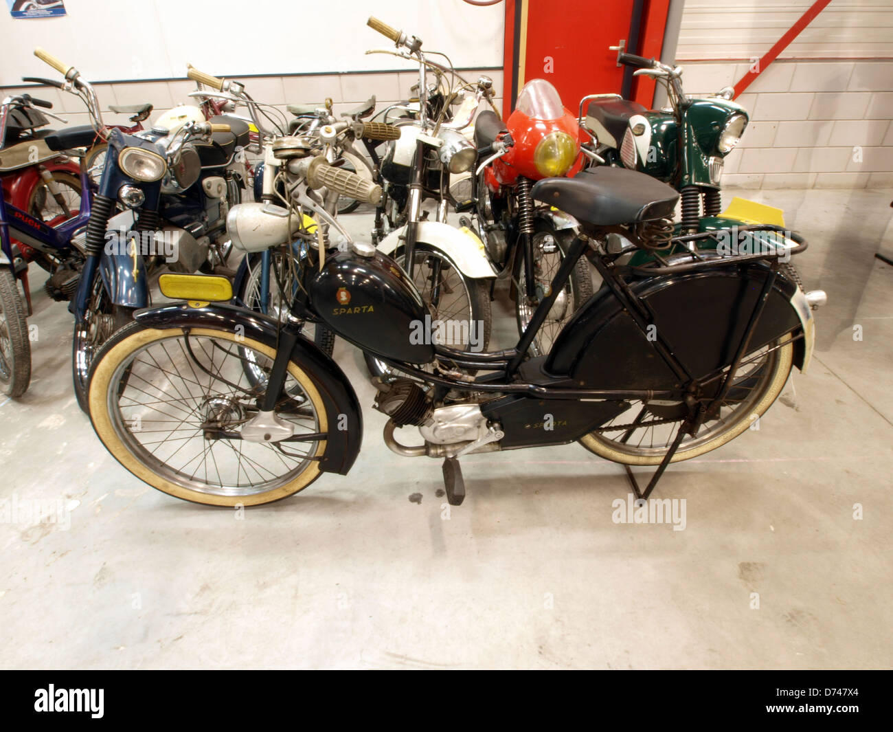 The Sparta moped, a classic from the mid-20th century, exemplifies the ...