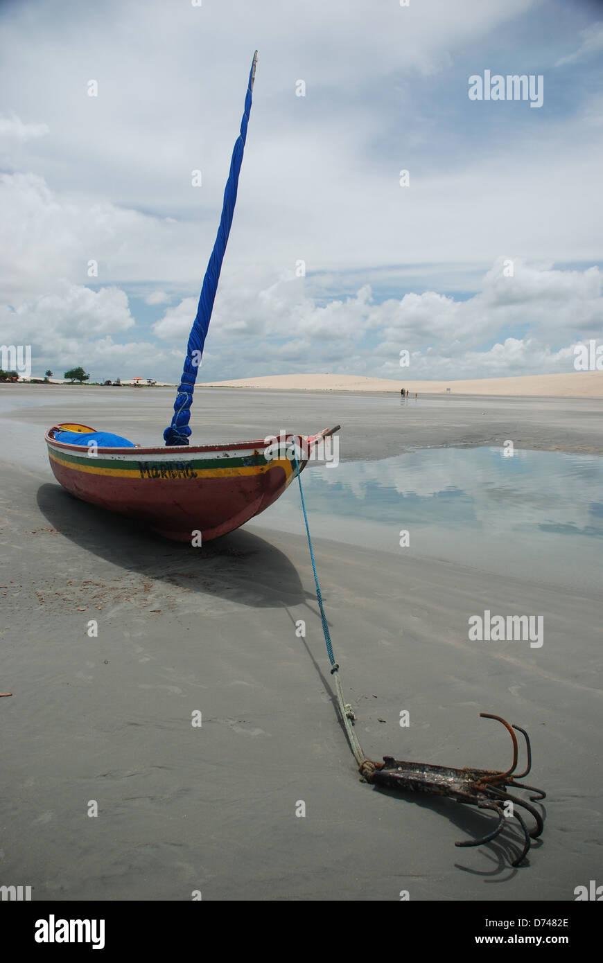 Jangada (typical brazilian boat) on a low tide beach. Jericoacoara ...