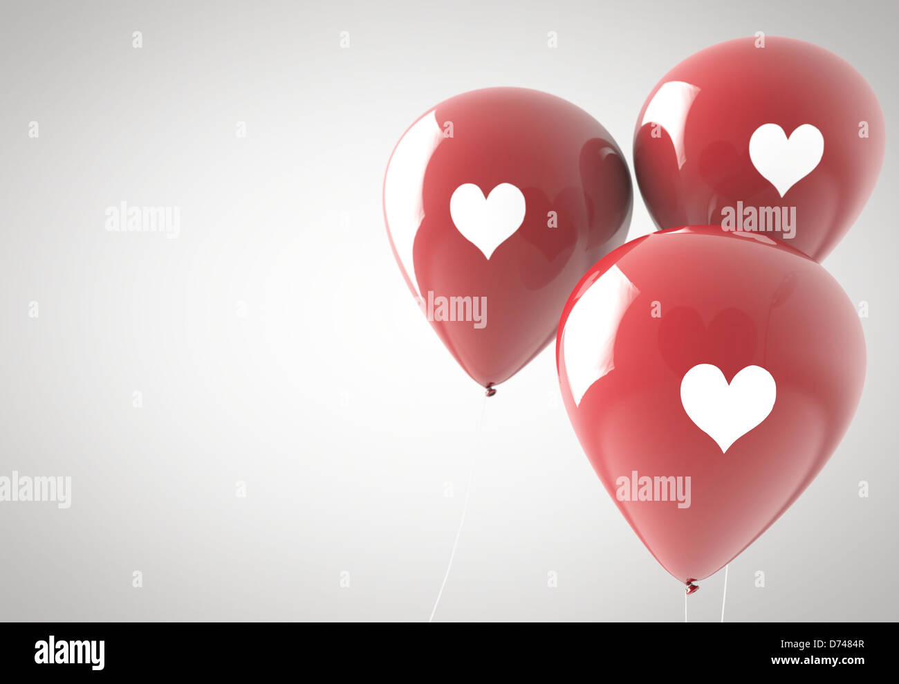 Red Ballons with heart imprint Stock Photo - Alamy