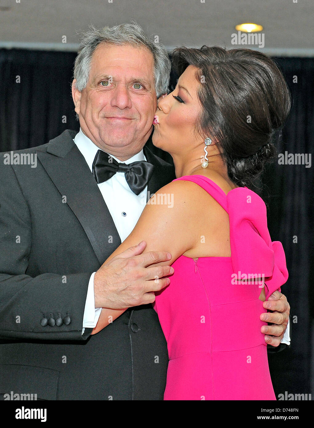 Julie Chen plants a kiss on Les Moonves' cheek as they arrive for the ...
