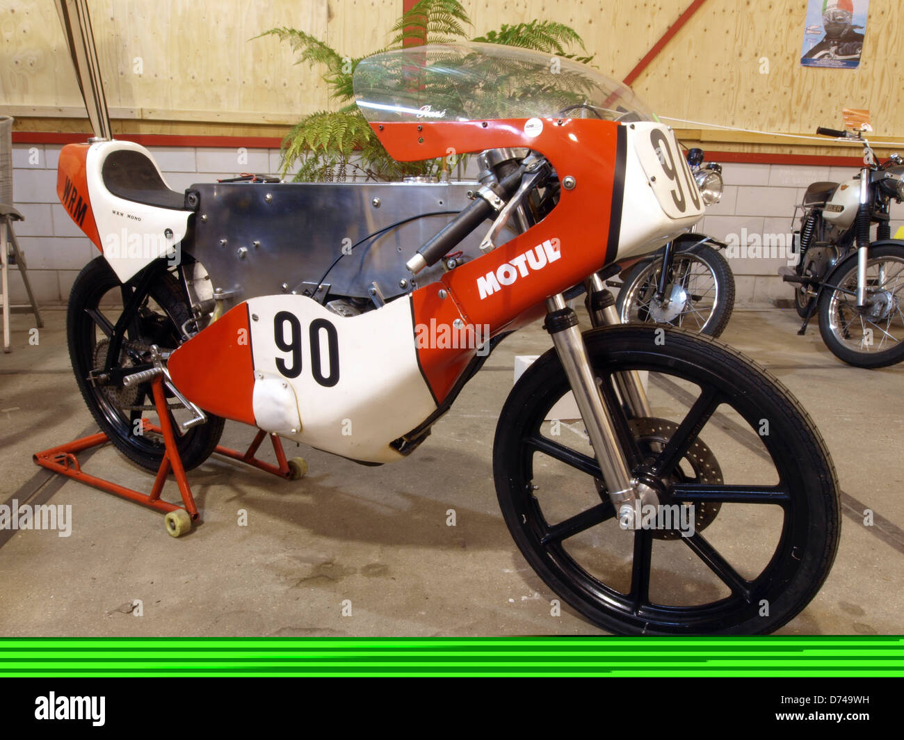 This image features a WRM mono motorcycle, known for its distinctive ...