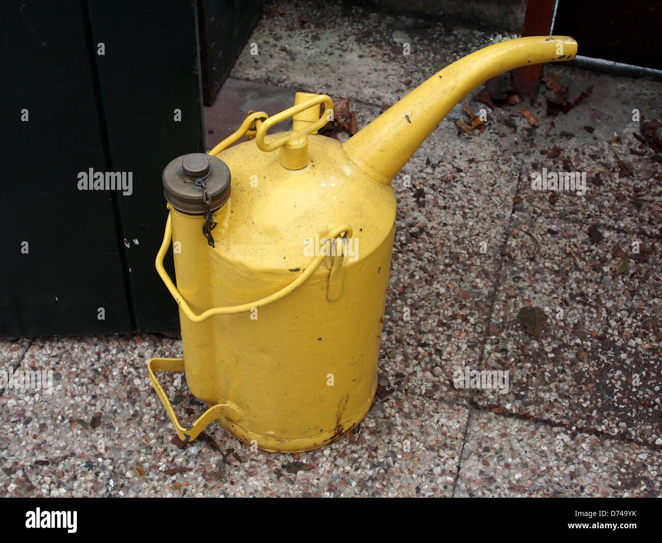 Yellow oil can Stock Photo - Alamy