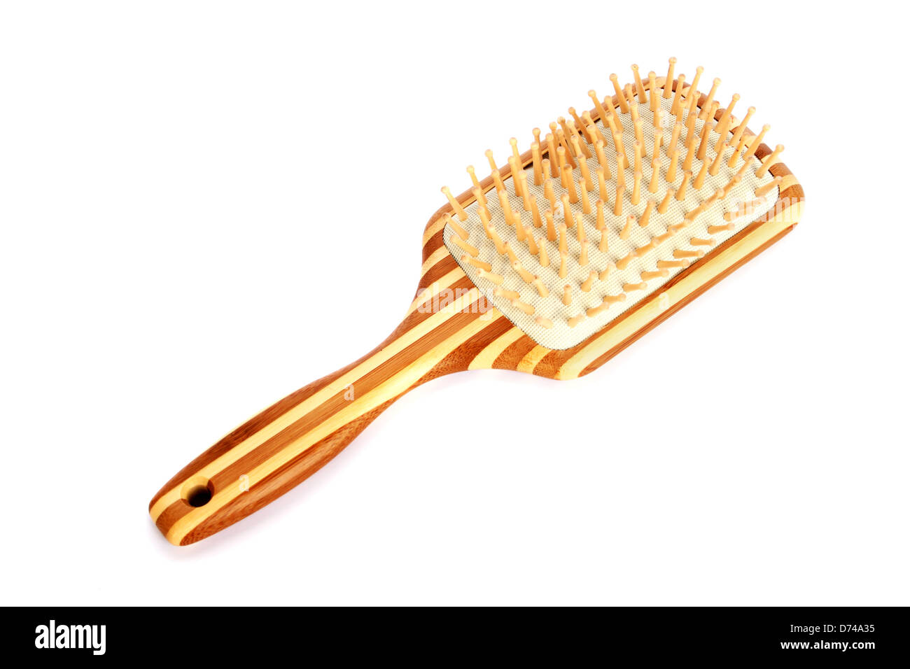 Wooden comb isolated on white background Stock Photo - Alamy