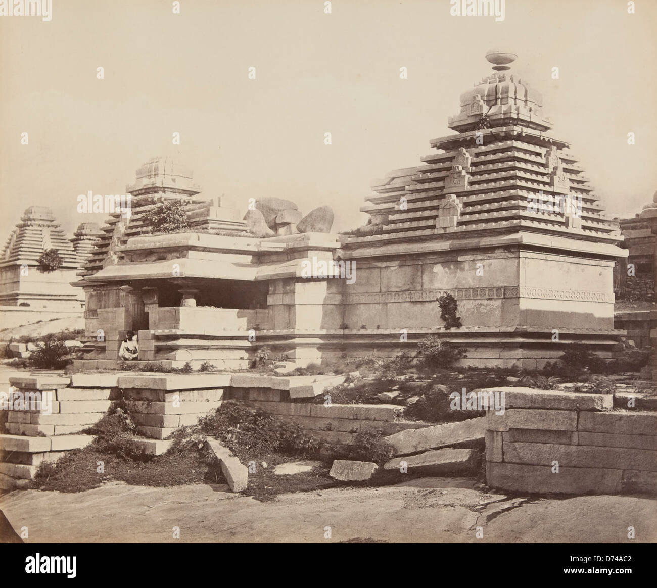 This conical-roofed stone temple is an architectural feature housed in ...