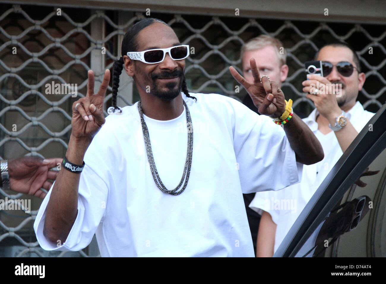 Snoop Dogg filming a video with club owner and businessman Jean-Roch ...